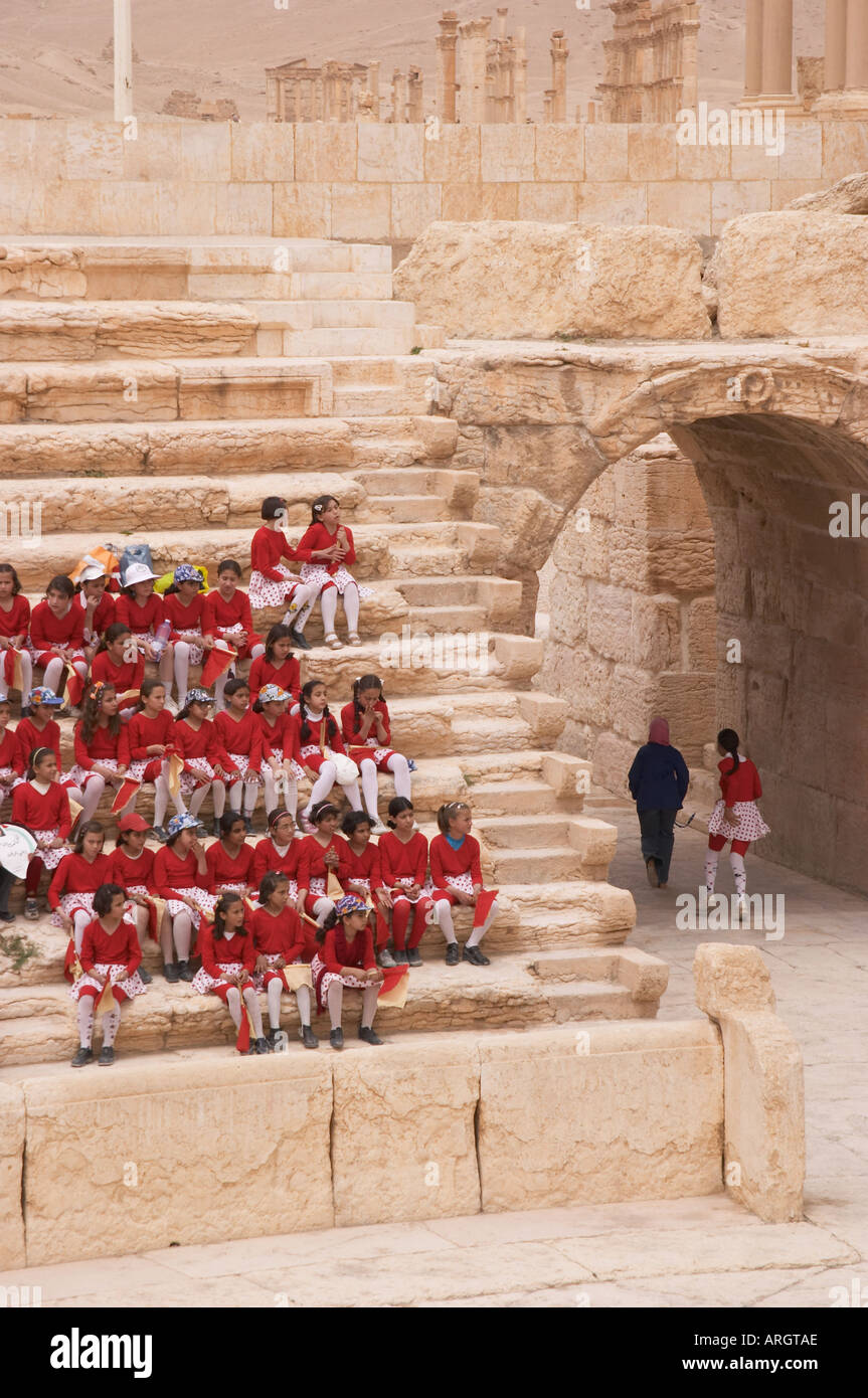 Syrian children in a theater watching a play in honour of syrian ...