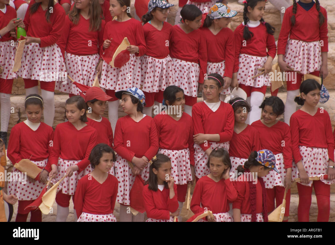 Syrian children in a theater watching a play in honour of syrian ...