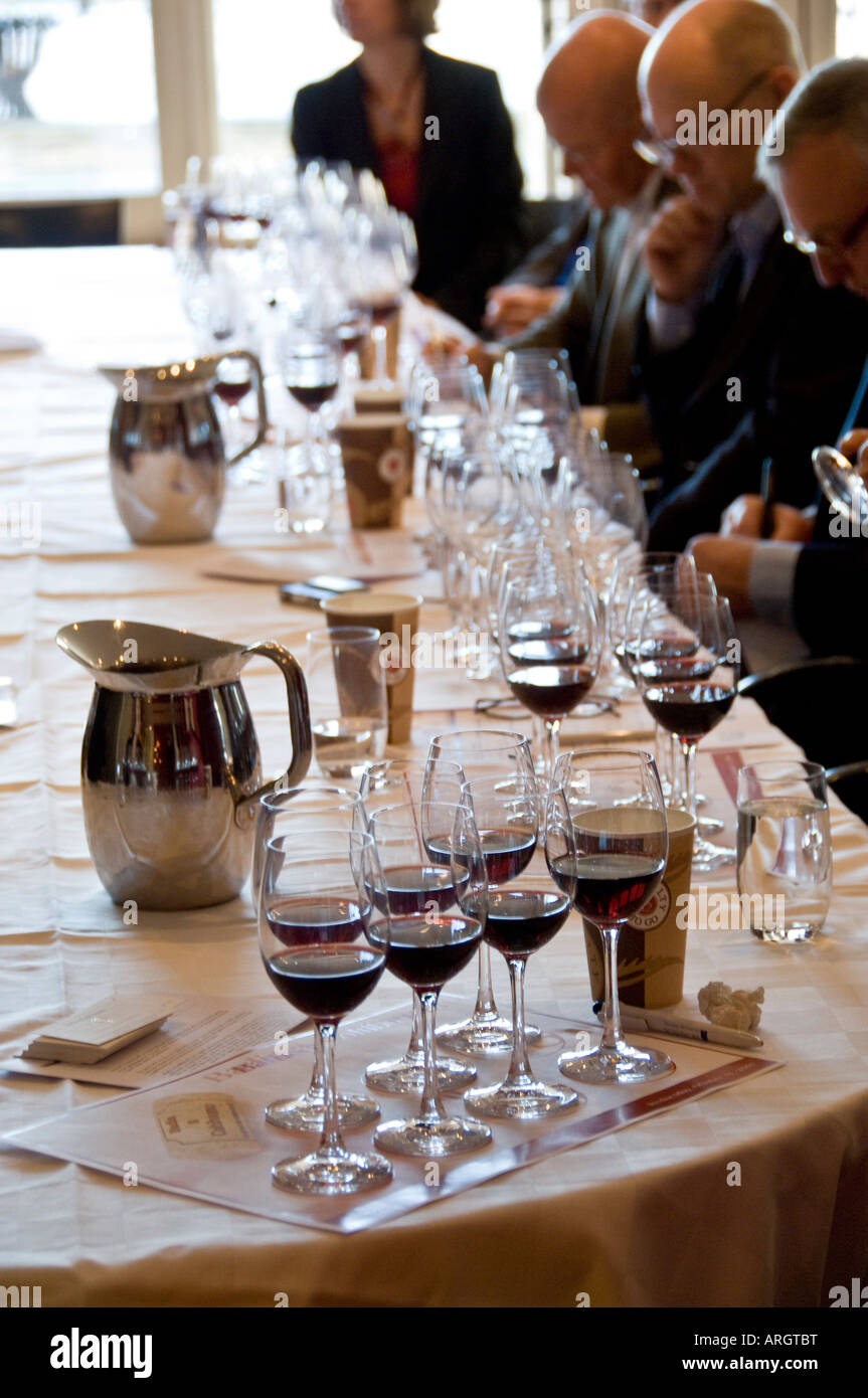 Group of people tasting red wine Stock Photo - Alamy