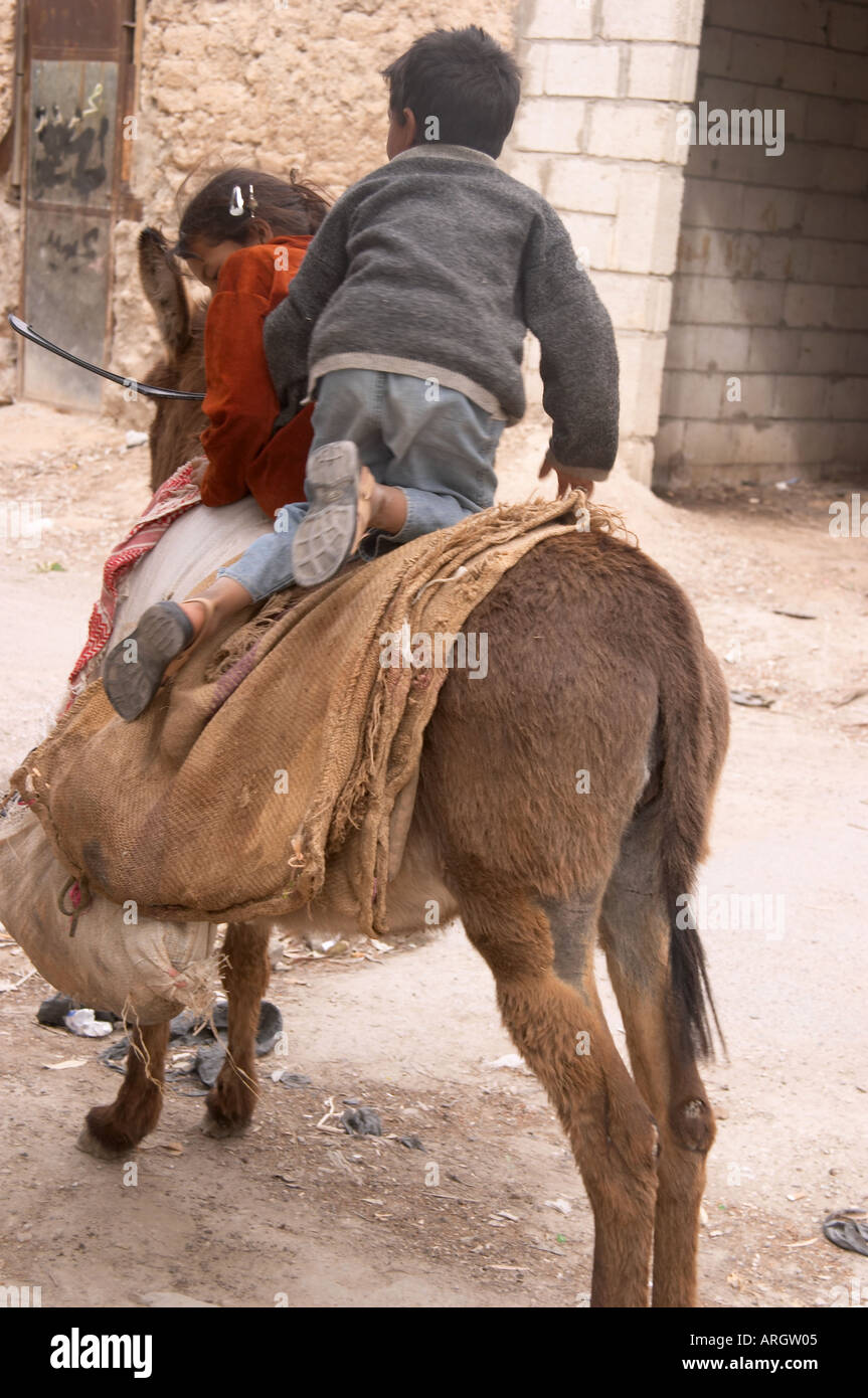 Muslim children playing on arab street hi-res stock photography and ...