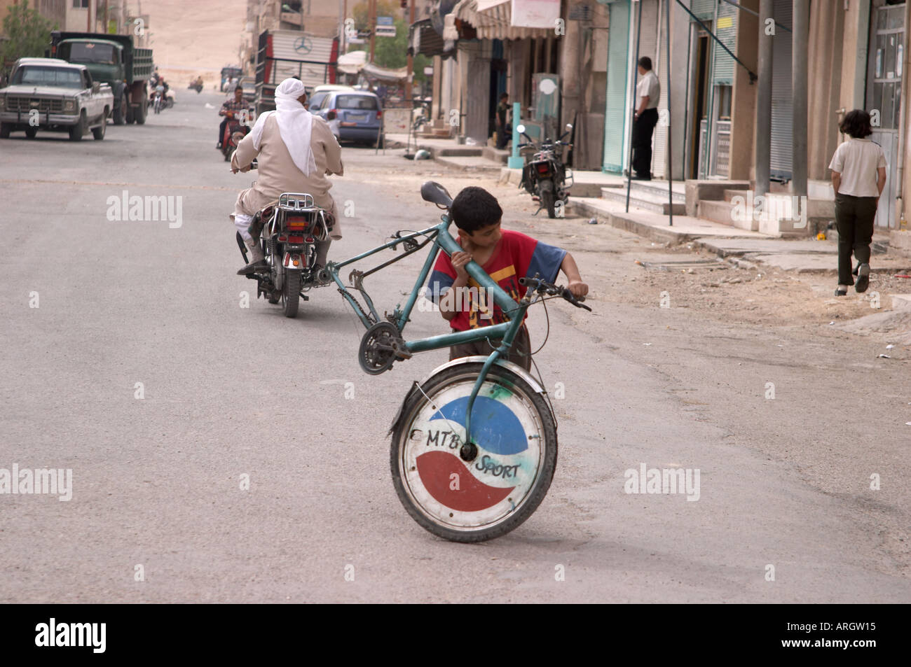 Muslim children playing on arab street hi-res stock photography and ...