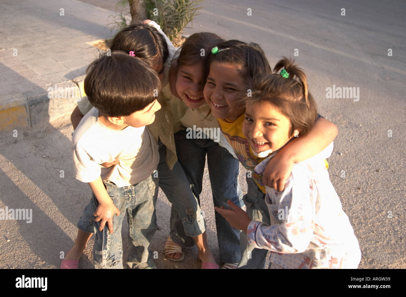 Palmyra Syria Children playing posiing Stock Photo - Alamy
