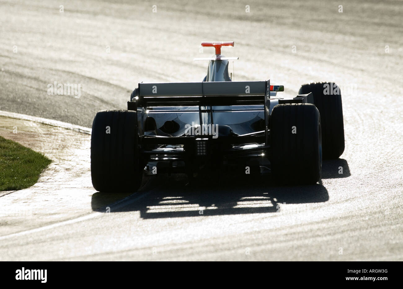 Formula 1 racecar speeds through curve Jan. 2008 Stock Photo - Alamy