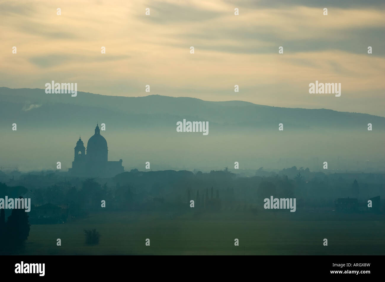 The Basilica Of Saint Mary Of Angels In Assisi Italy In The Mist Of The Early Morning Stock