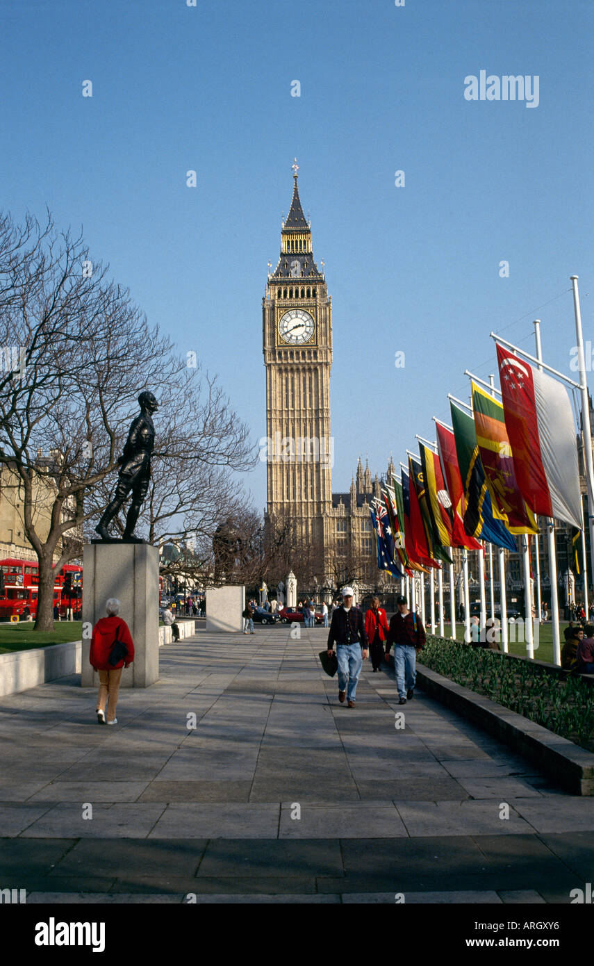 A view along Parliament Square past flags of many nationalities towards ...