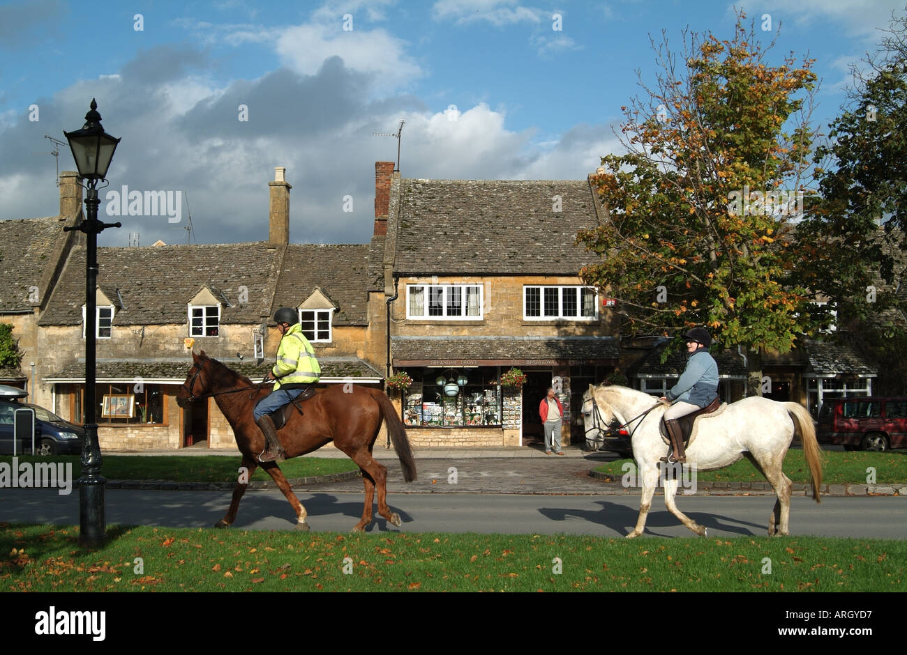 Horse riders in The Cotswolds town of Broadway west central England UK ...
