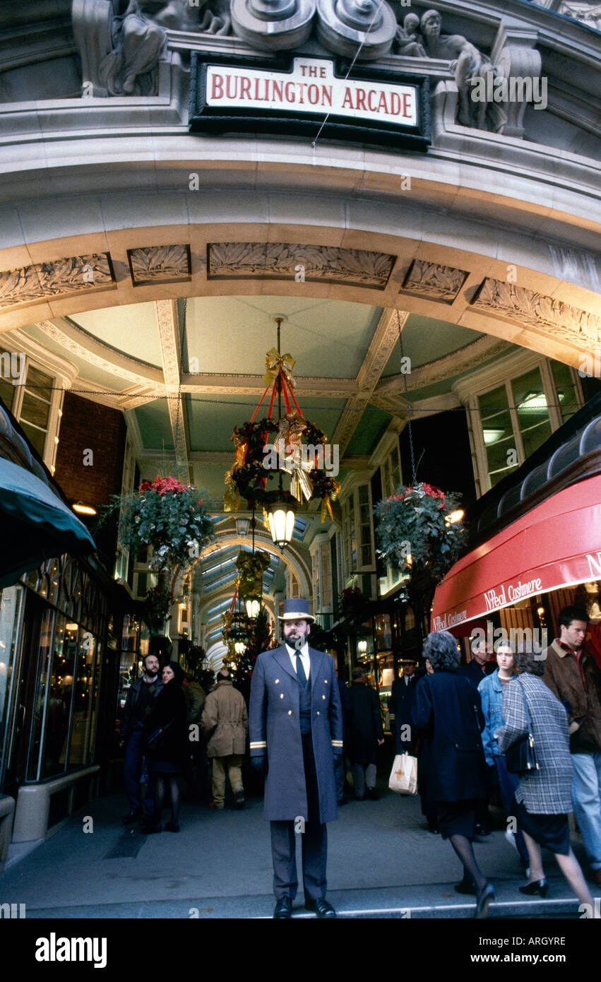 A uniformed commissionaire stands surveying the scene outside the ...