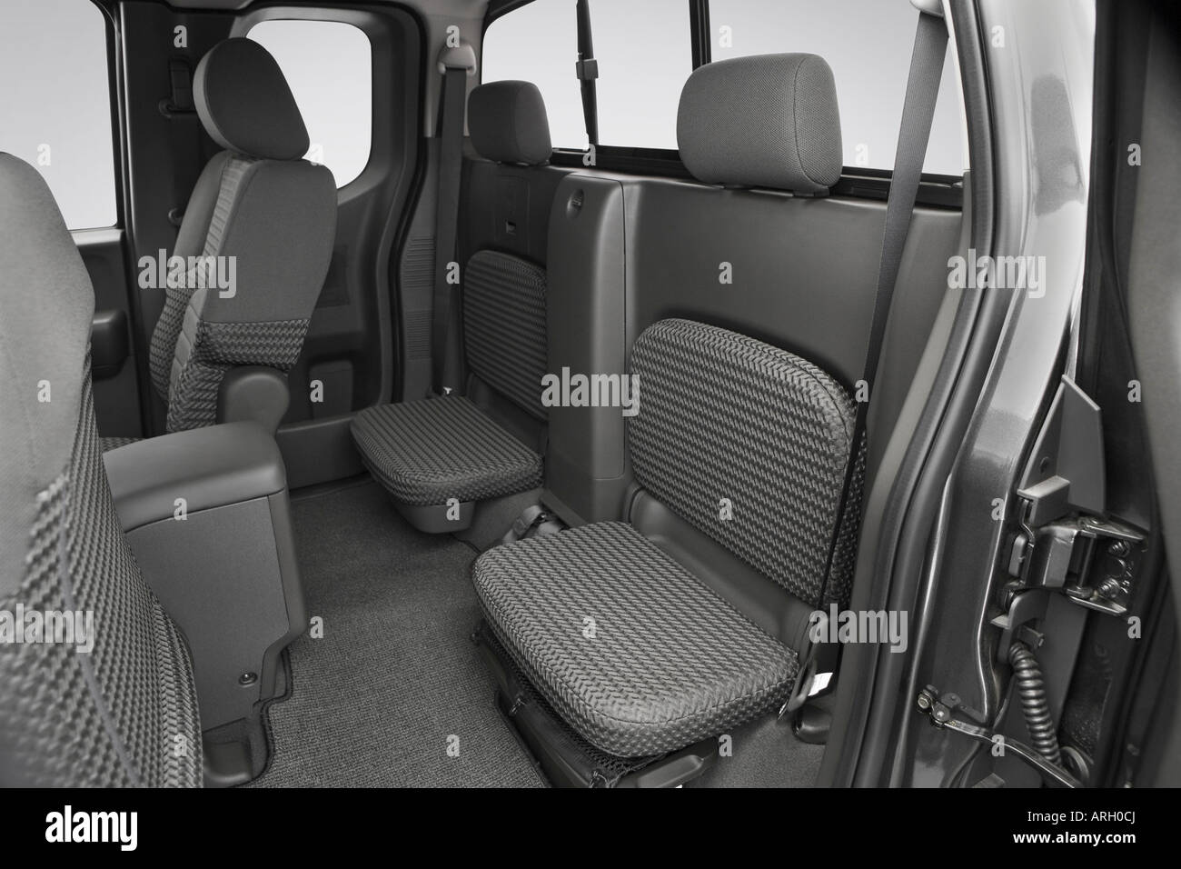 2007 Nissan Frontier SE in Gray - Rear seats Stock Photo - Alamy