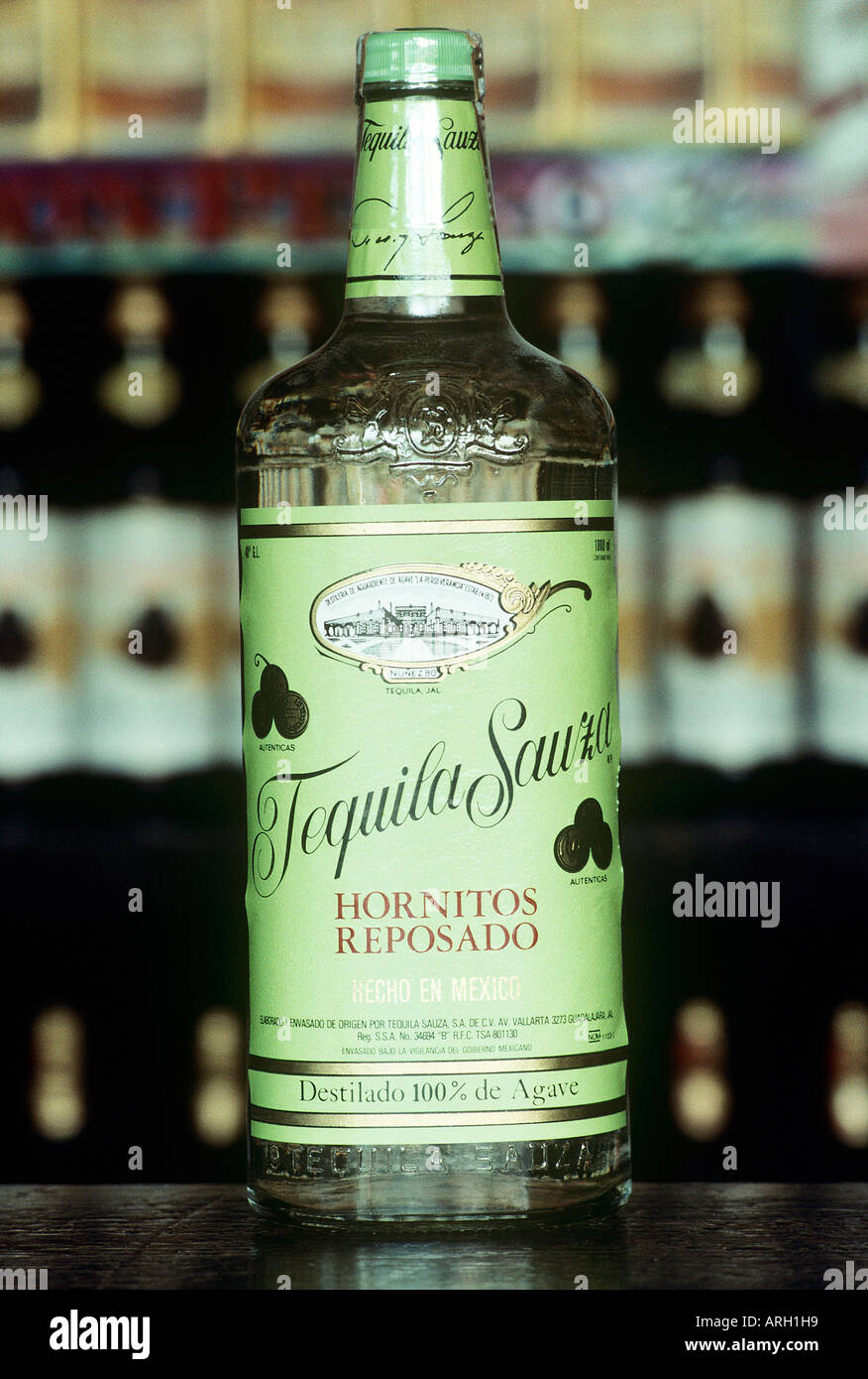 A bottle of tequila made with the blue maguey cactus agave and produced ...