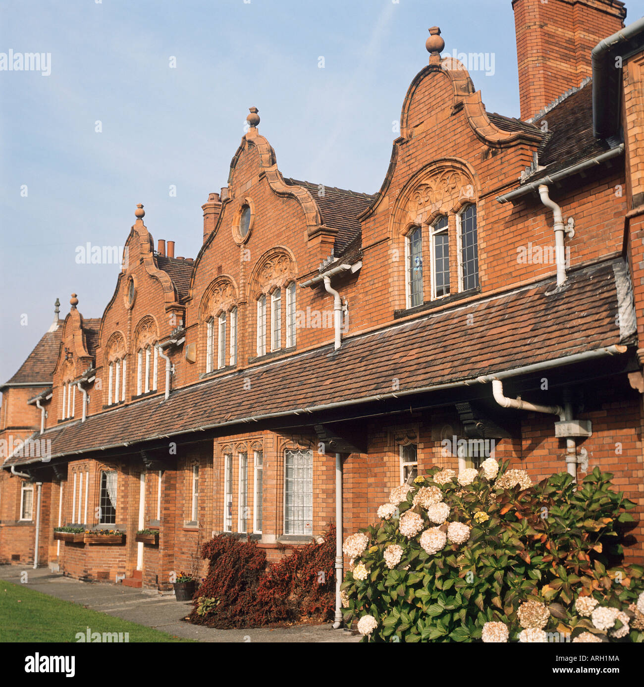 A terrace of brick built houses with ornade facades in Port Sunlight ...