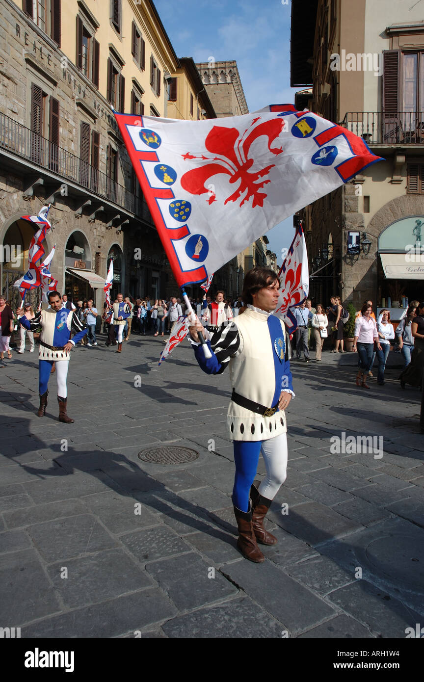 Flag throwers put on a colourful display in the streets of Florence ...