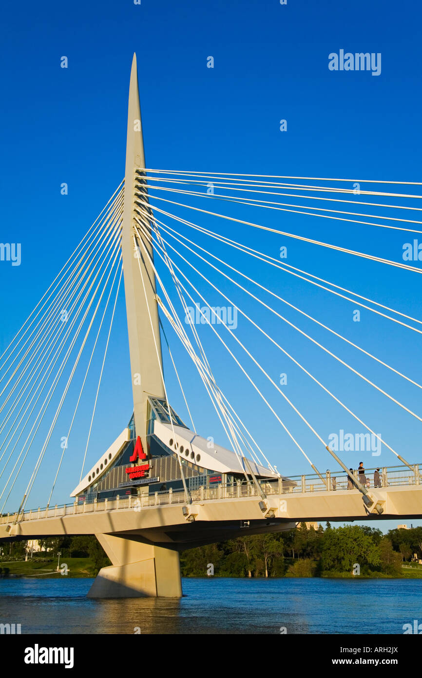 Bridge across a river, Esplanade Riel Pedestrian Bridge, Red River ...