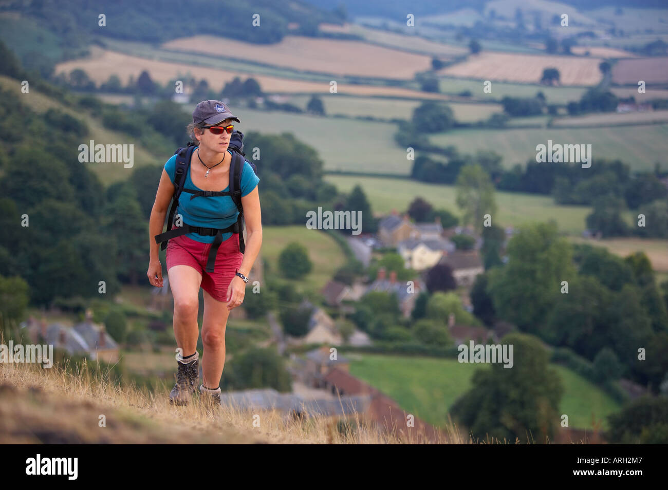 a woman hiking Somerset England UK MR Stock Photo - Alamy