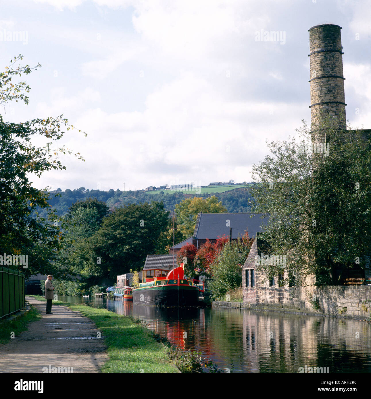 The Rochdale canal flowing through the ancient mill town of Hebden ...