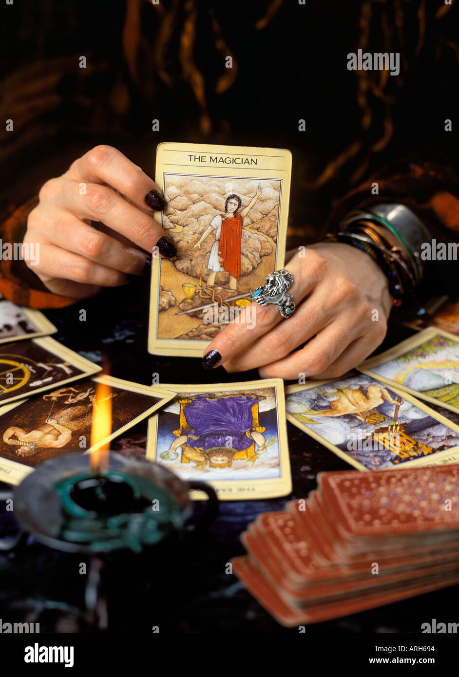 hands showing tarot card Stock Photo - Alamy