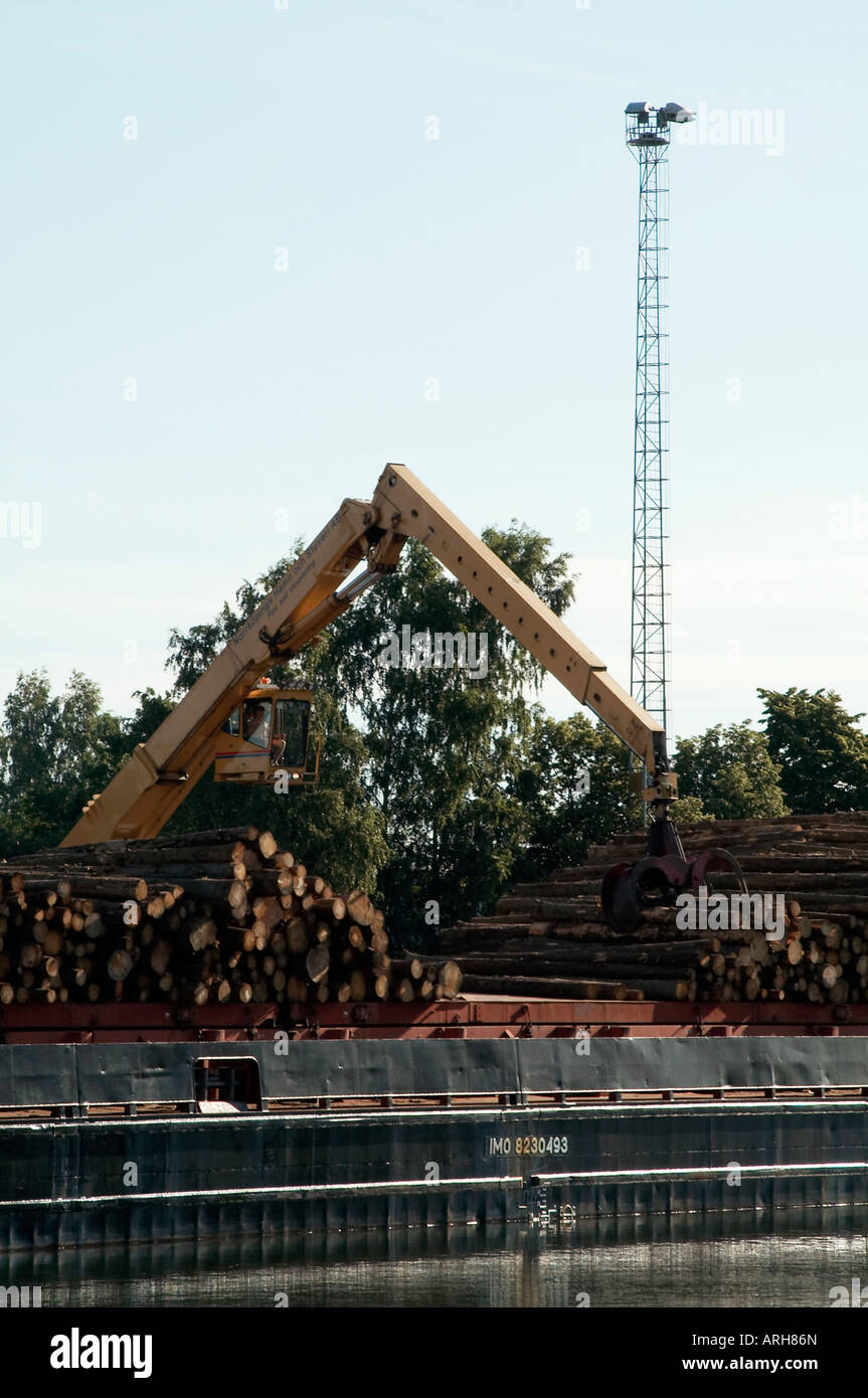 timber export wood sweden log loading boat water industry industrial ...