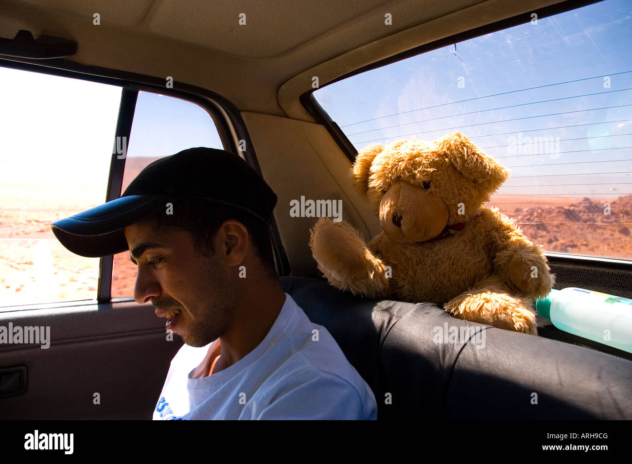 Moroccan guy Aziz with his puppet in a car Midelt Morocco Stock Photo ...