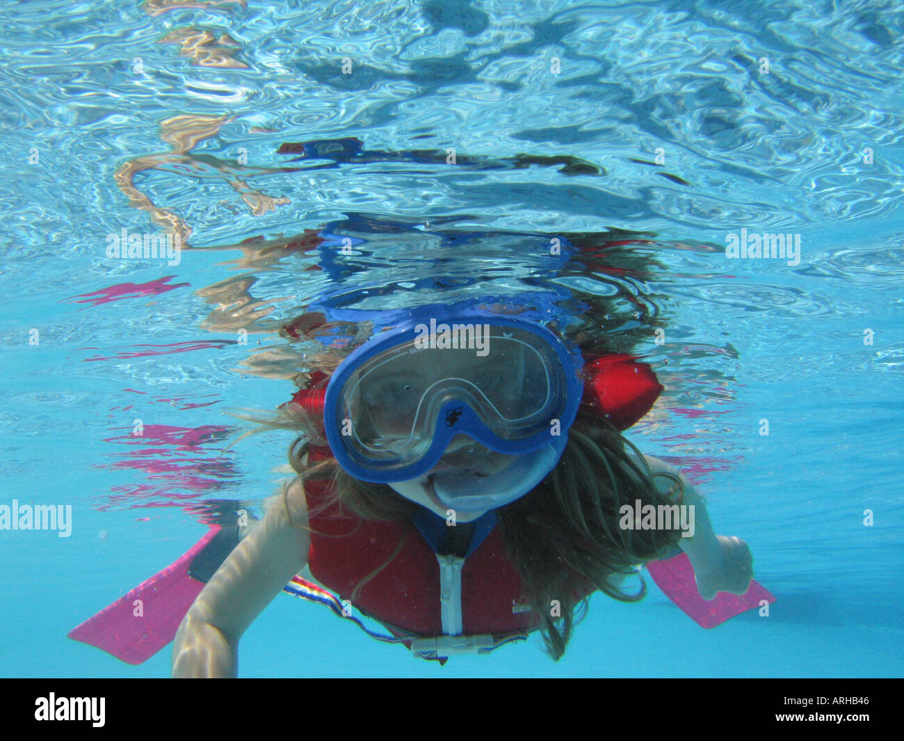 Underwater view of a young girl 12 13 scuba diving Moorea Tahiti French ...