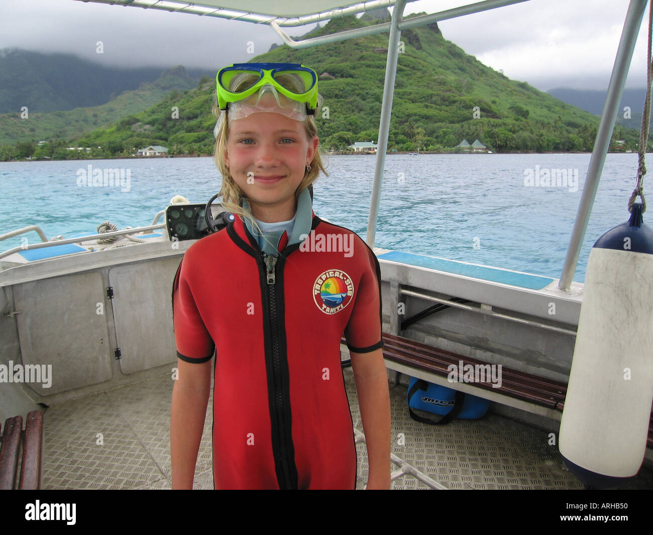 Portrait of a young girl 12 13 in a boat Moorea Tahiti French Polynesia ...