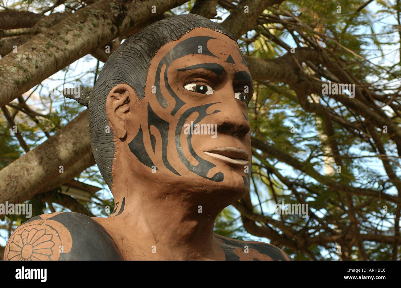Close up of the face of a native statue Moorea Tahiti French Polynesia ...