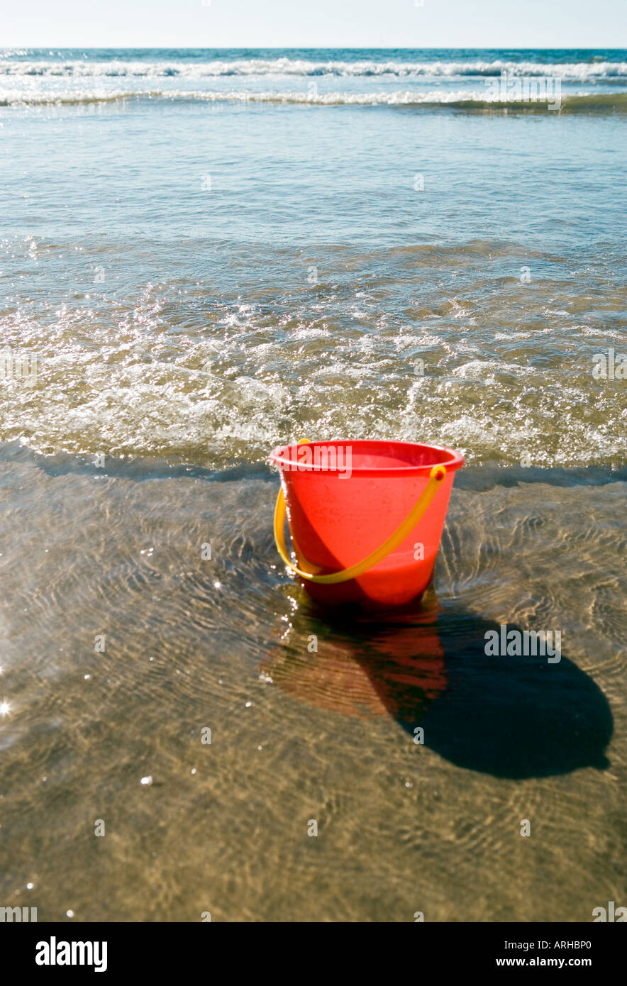 Bucket and spade on a beach hi-res stock photography and images - Alamy
