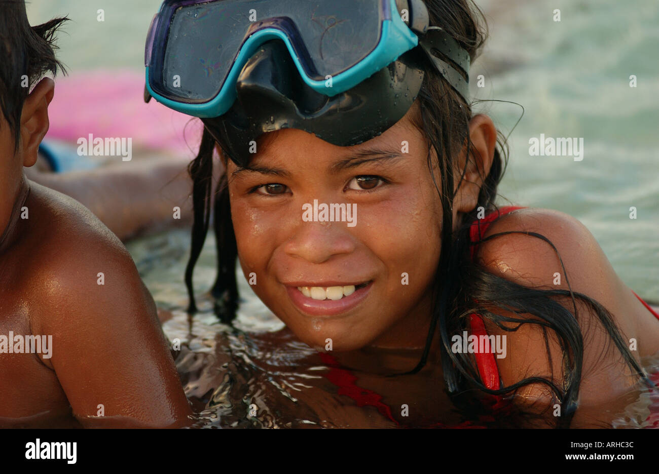 Close up of a young girl wearing scuba gear Moorea Tahiti French ...