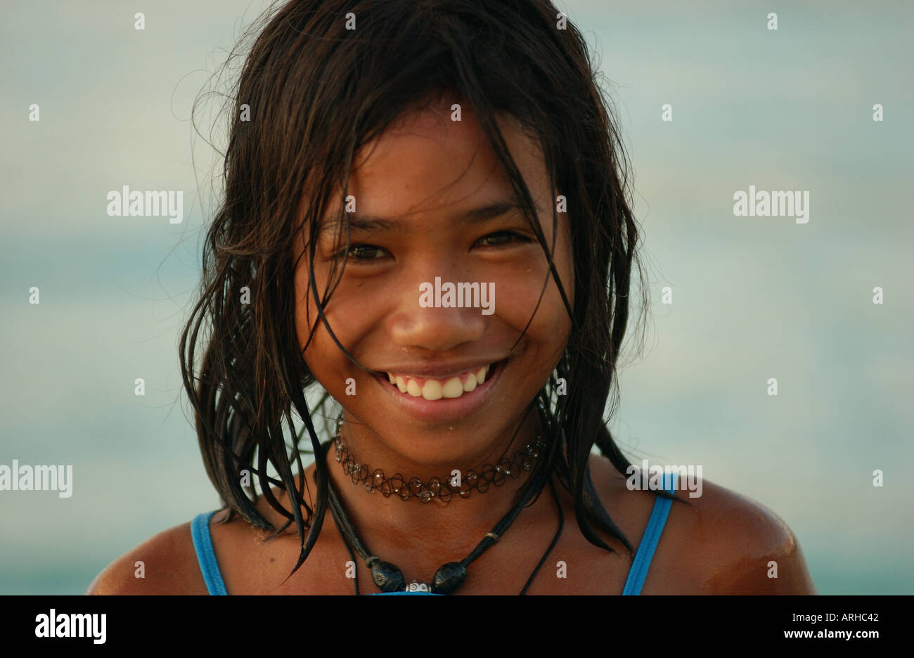 Portrait of a young girl Moorea Tahiti French Polynesia South Pacific ...