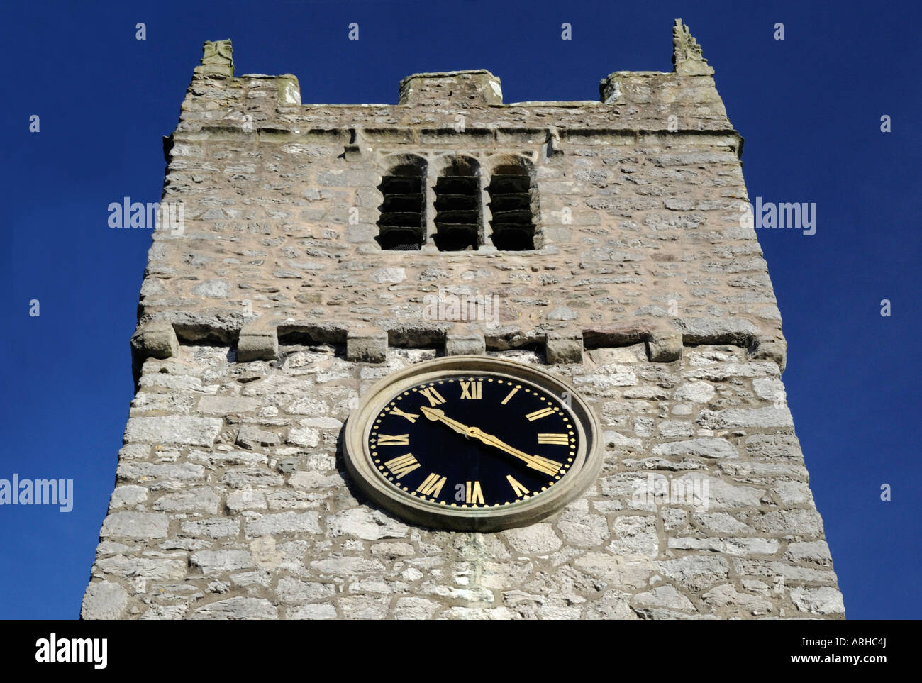 West tower and clock. Church of Saint Michael, Beetham, Cumbria ...