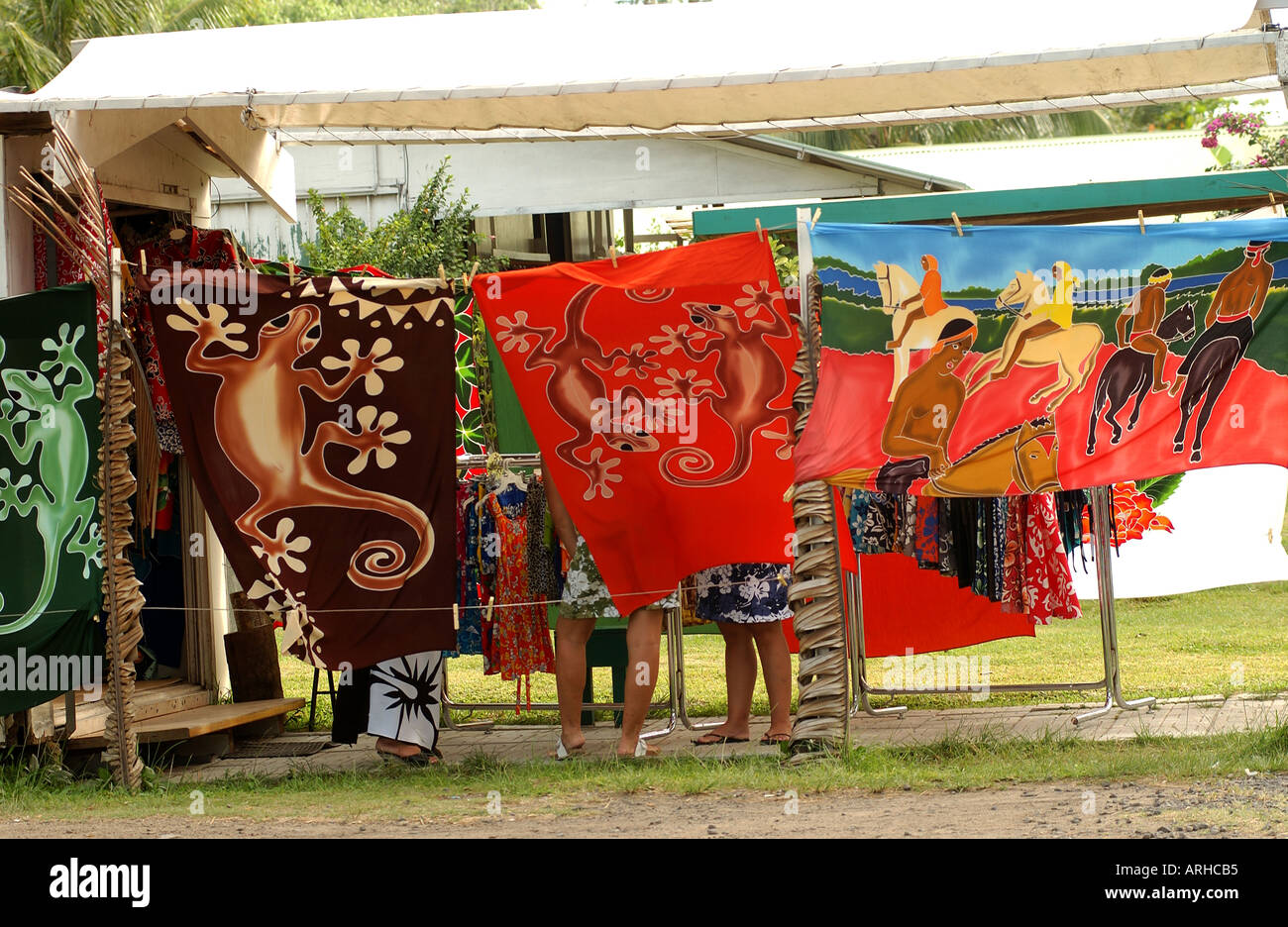 Bright colored folk paintings hung to dry Moorea Tahiti French ...