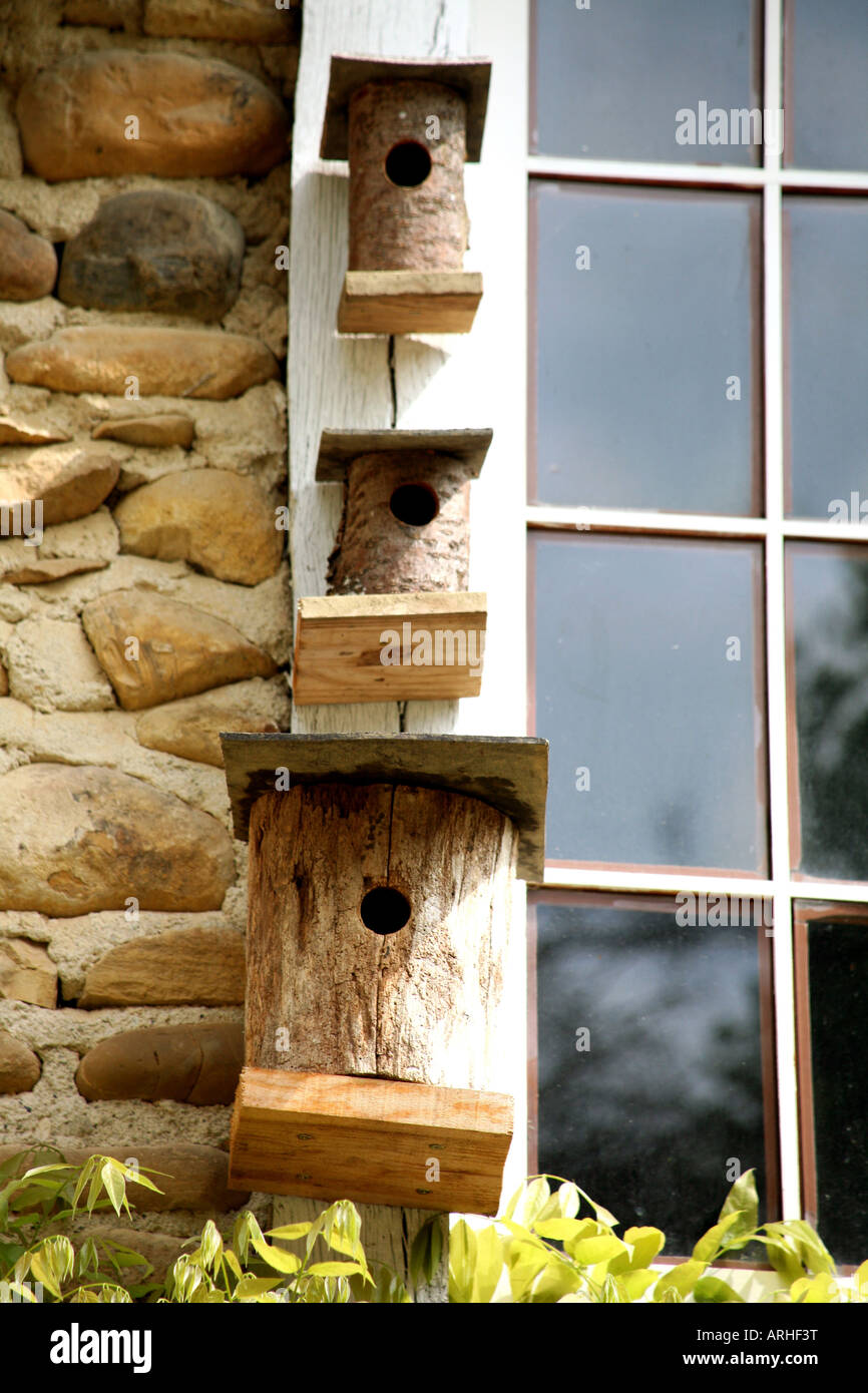 High rise bird boxes on house wall Stock Photo - Alamy
