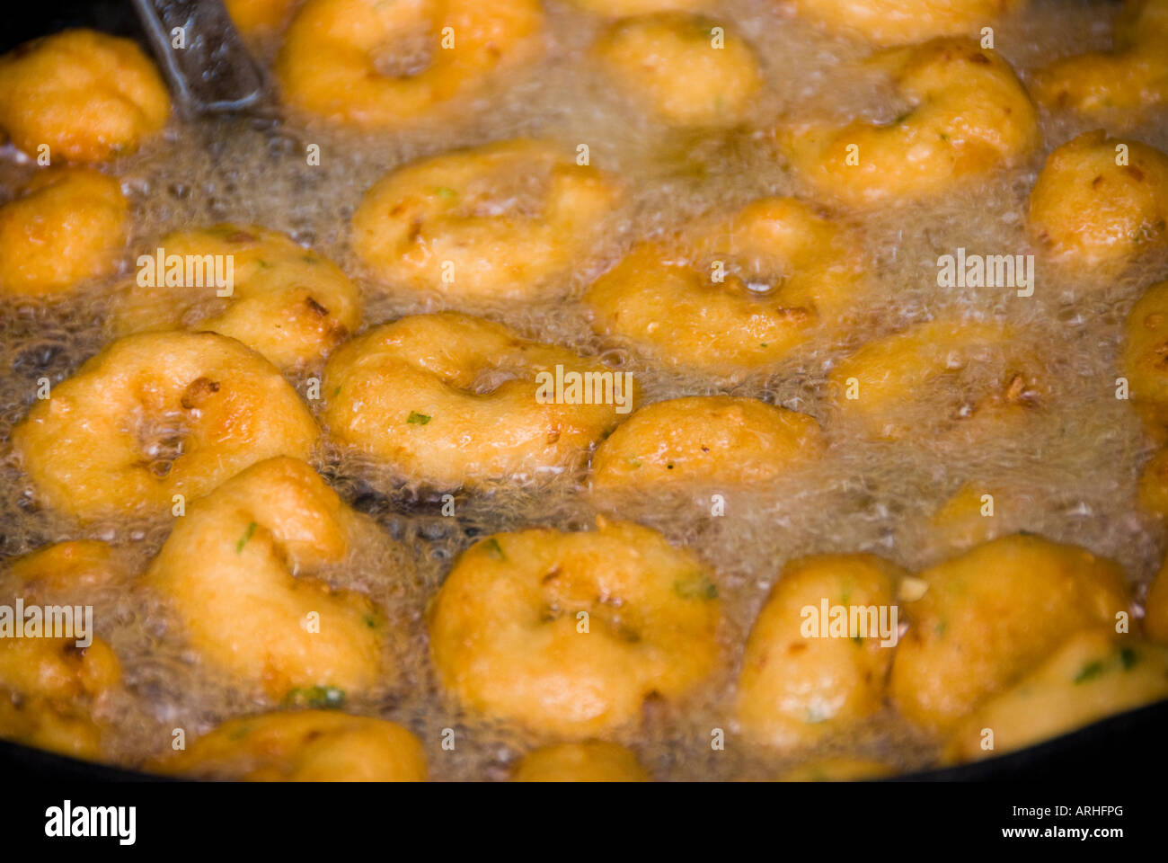 Vada being fried in India Stock Photo - Alamy