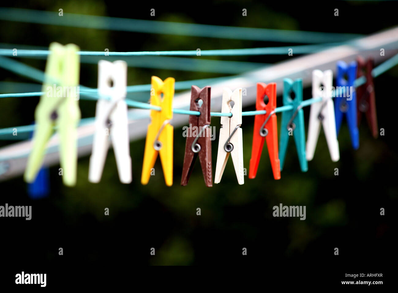 Clothes pegs on washing line Stock Photo - Alamy