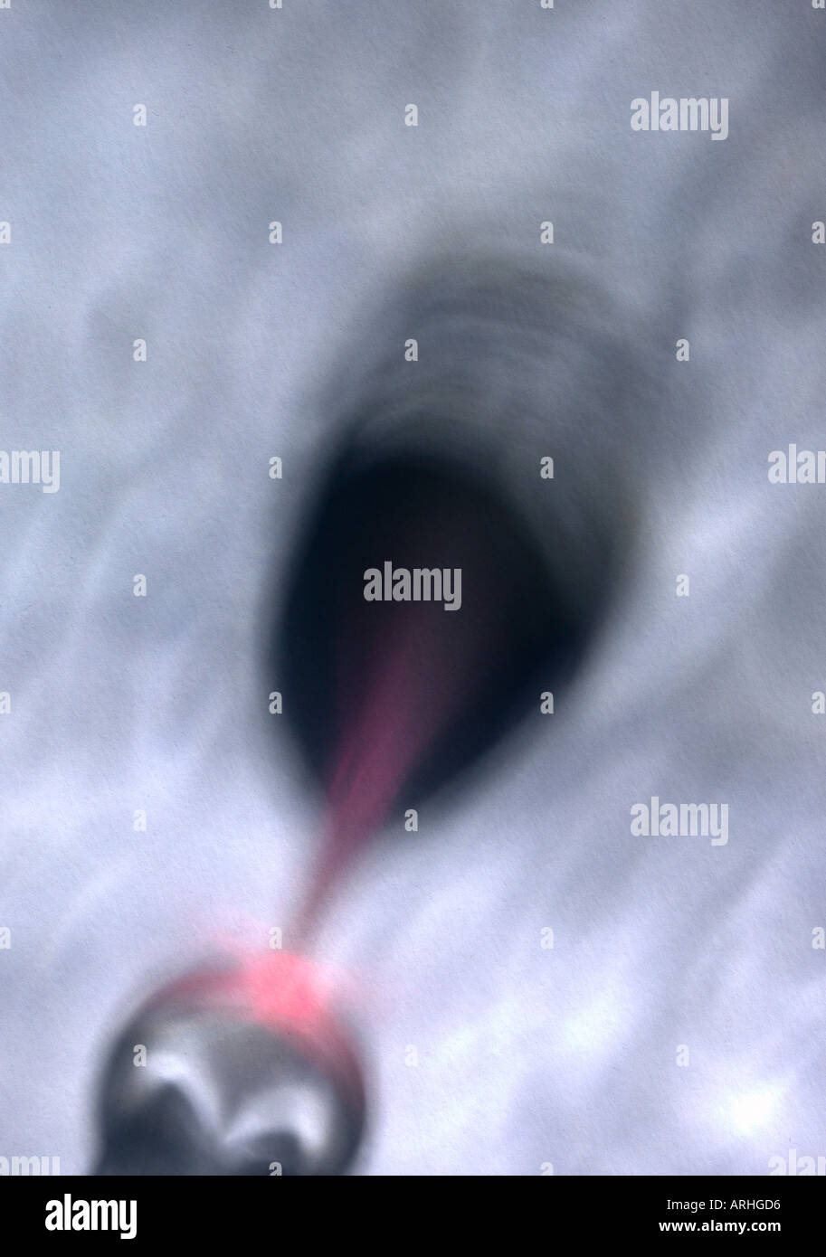 GLASS OF RED WINE CASTING SHADOW ONTO DAPPLED BACKGROUND Stock Photo ...