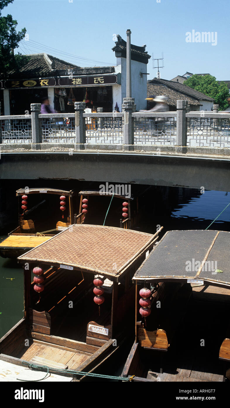 Boats canal and bridge near the Humble Administrators Garden Suzhou ...