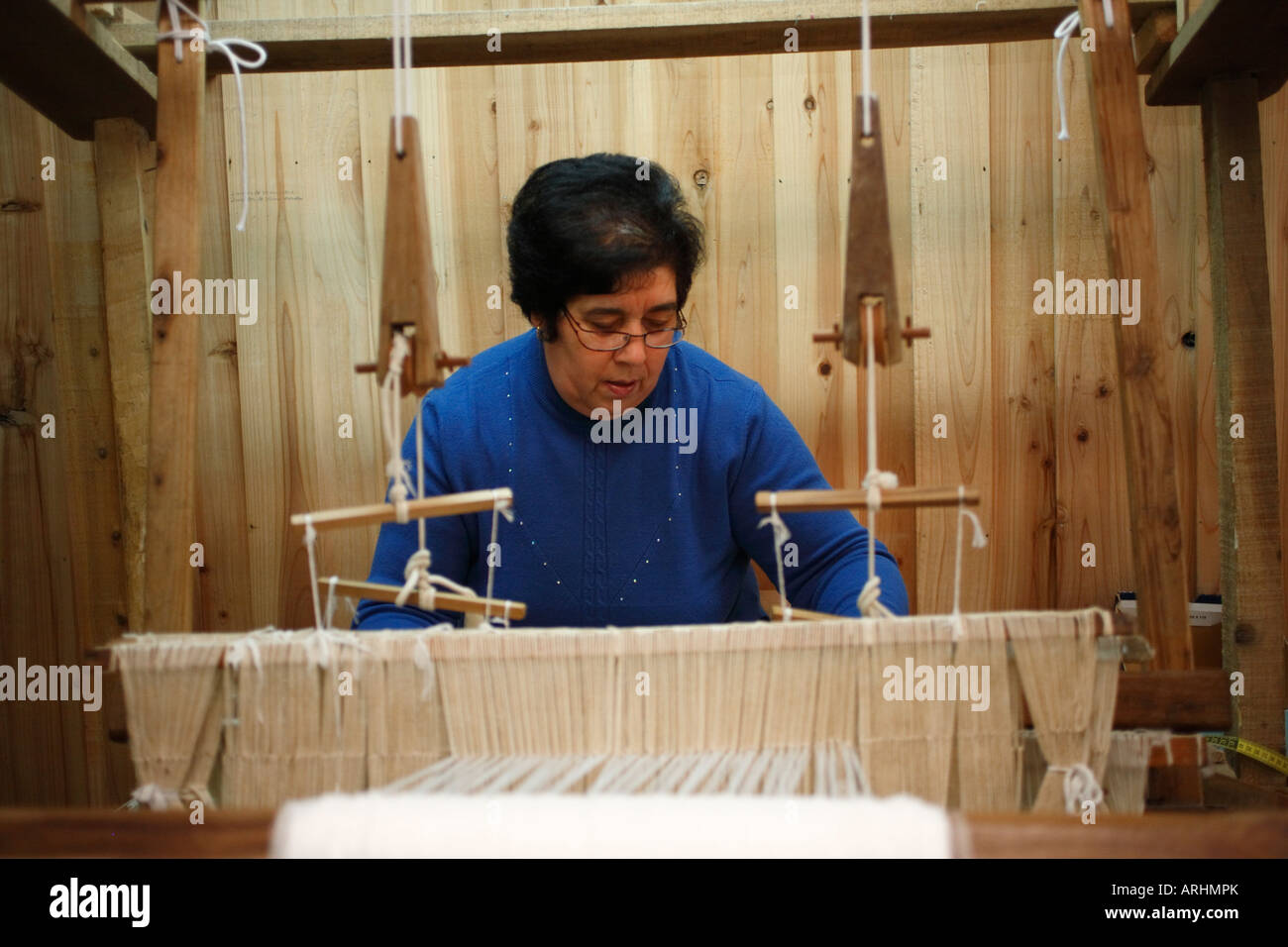 Azorean craftswoman weaving Capelas Sao Miguel island Azores Portugal ...