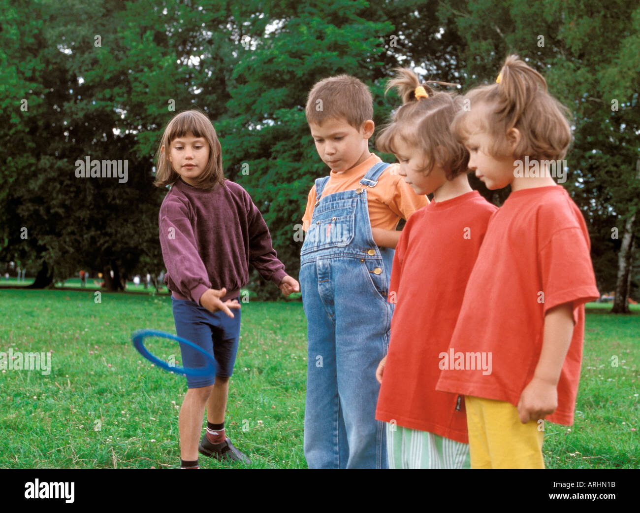 children playing with circles MR8373 MR8371 MR8372 Stock Photo - Alamy