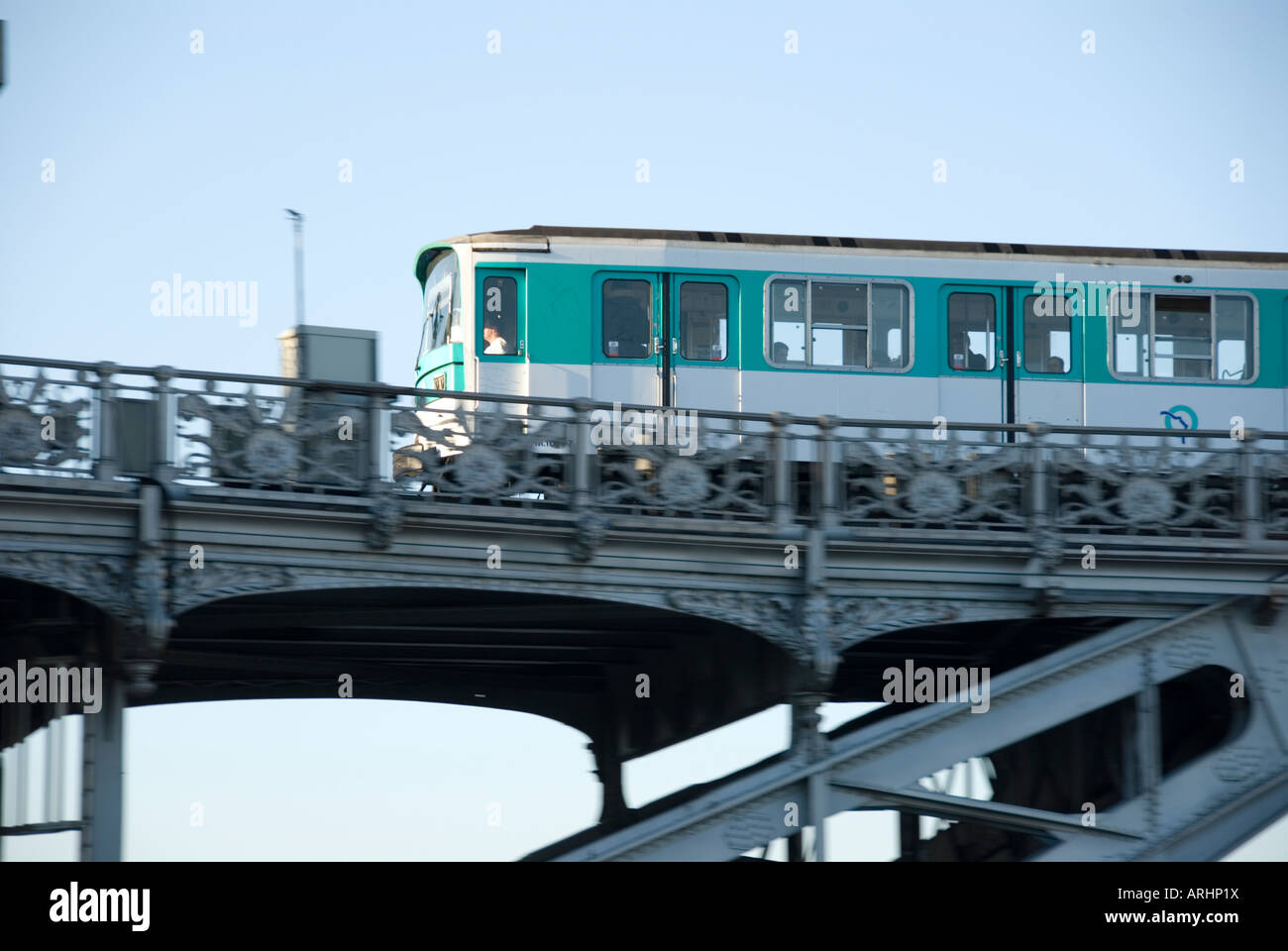 Metro train crossing a bridge in Paris France Stock Photo - Alamy