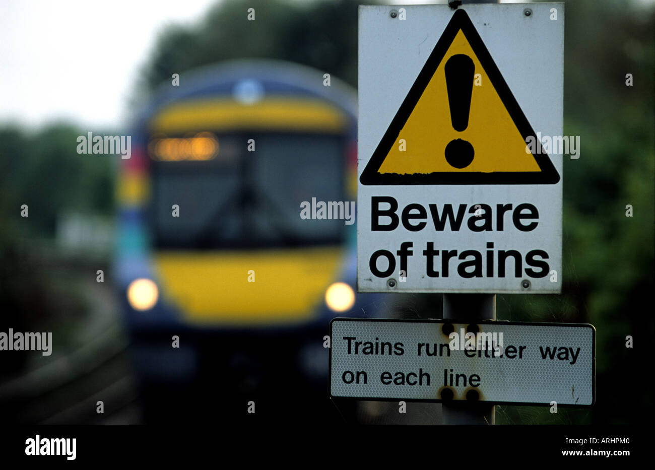 Beware of trains sign on the platform of Woodbridge station on the ...