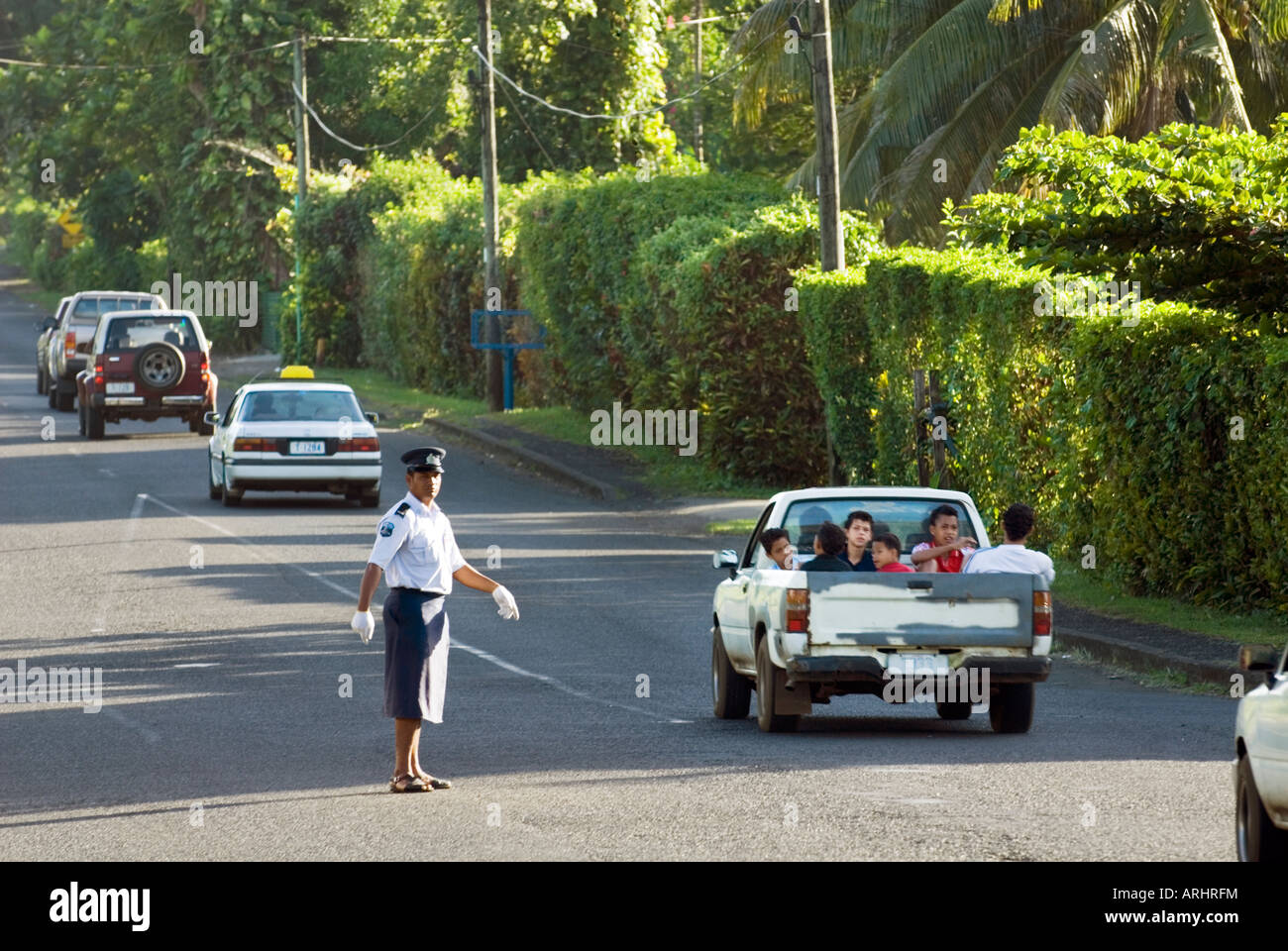 traffic policeman regulates the traffic in the streets of APIA SAMOA ...