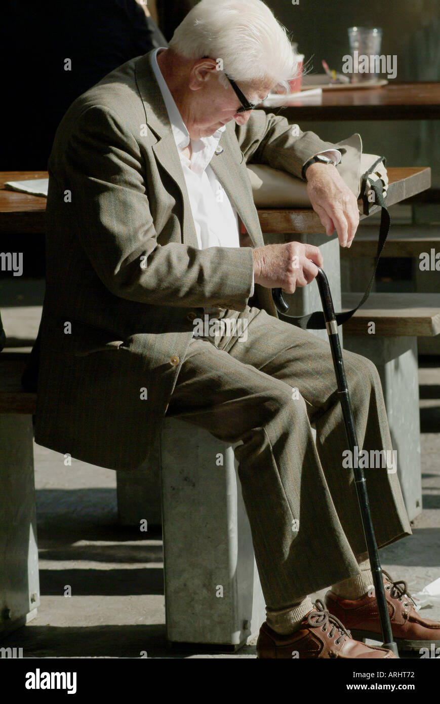 Pensive old man sitting alone hi-res stock photography and images - Alamy