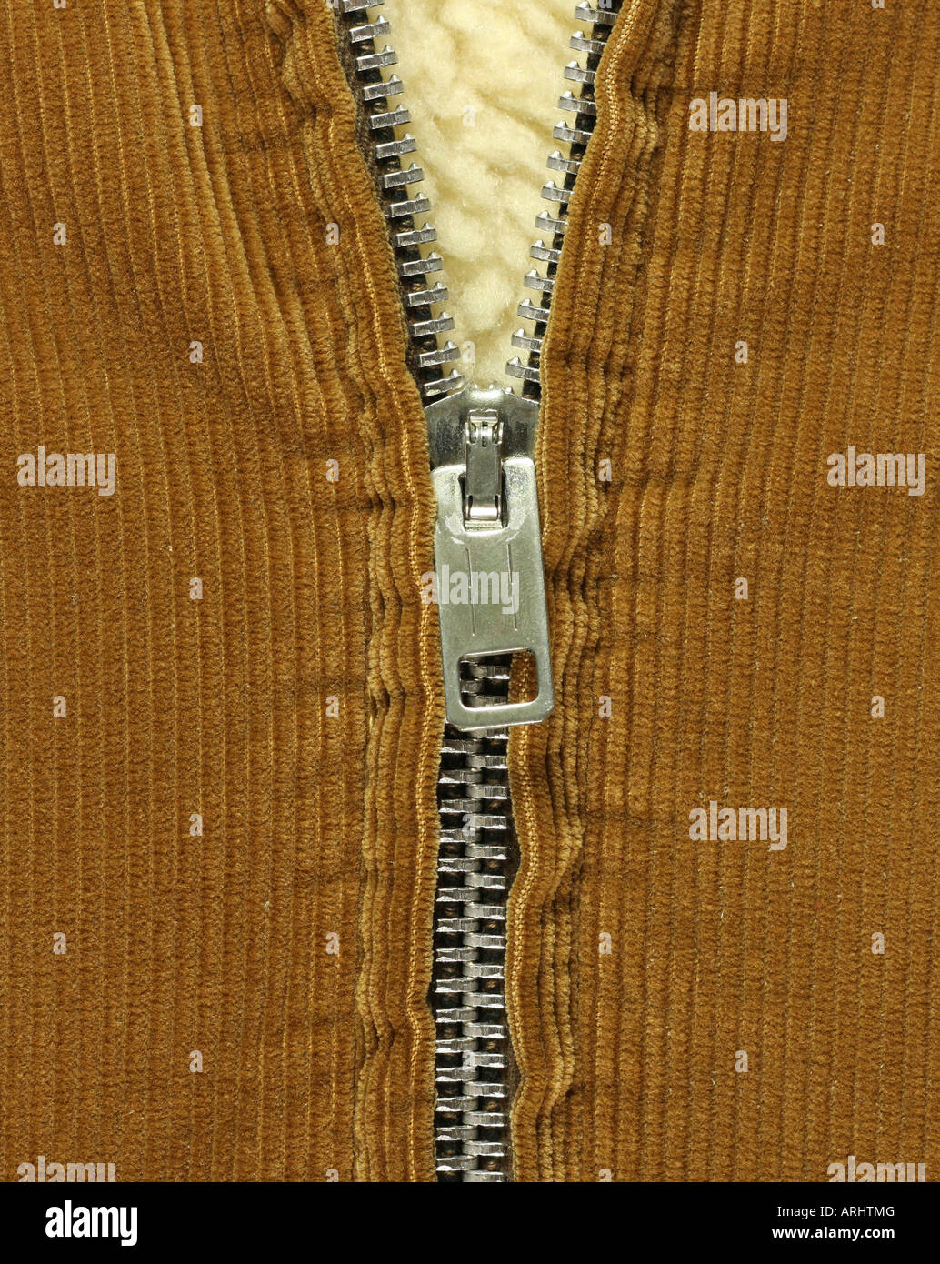 Half open brown coat zipper Stock Photo - Alamy
