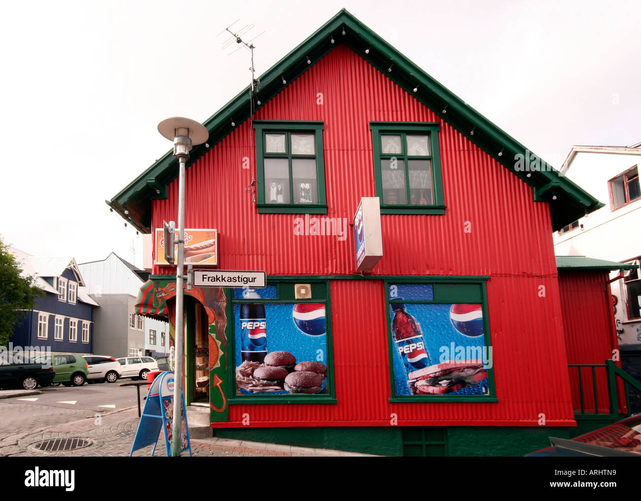 Brightly painted corner shop in Reykjavik, Iceland Stock Photo - Alamy