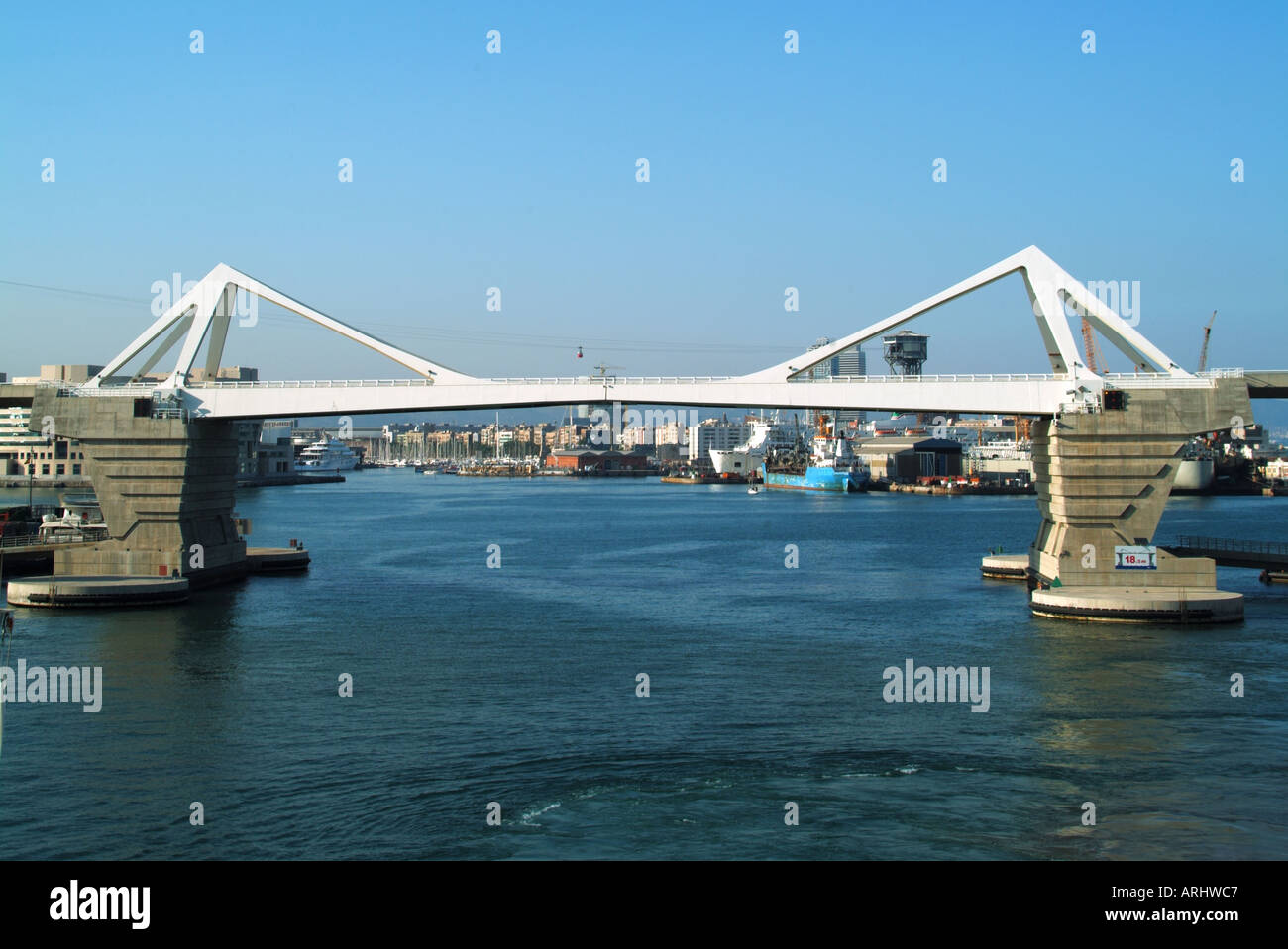 Barcelona port road bridge with ships beyond and cable car distant ...