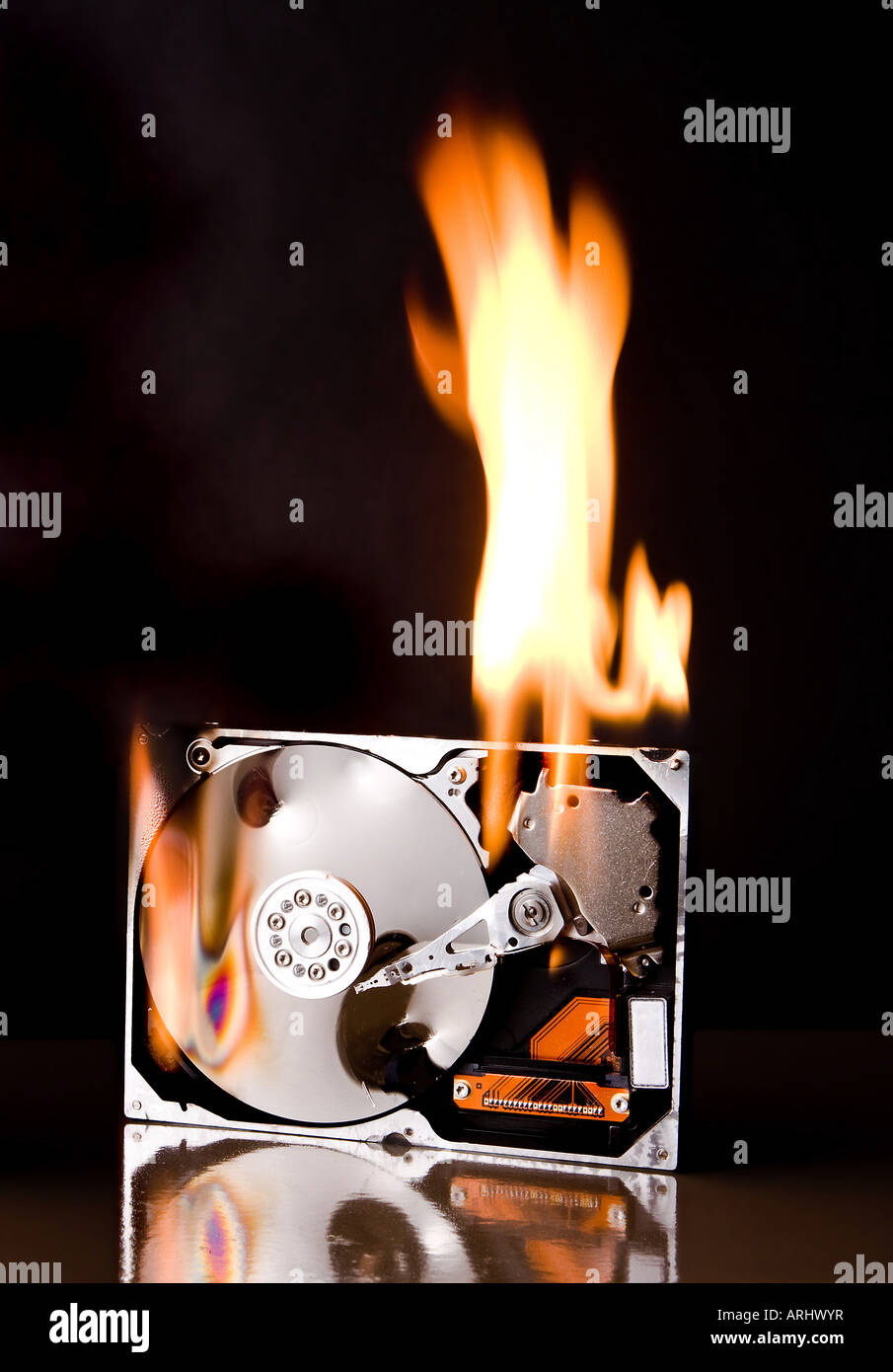 Opened hard drive on fire all brand names have been removed Stock Photo ...