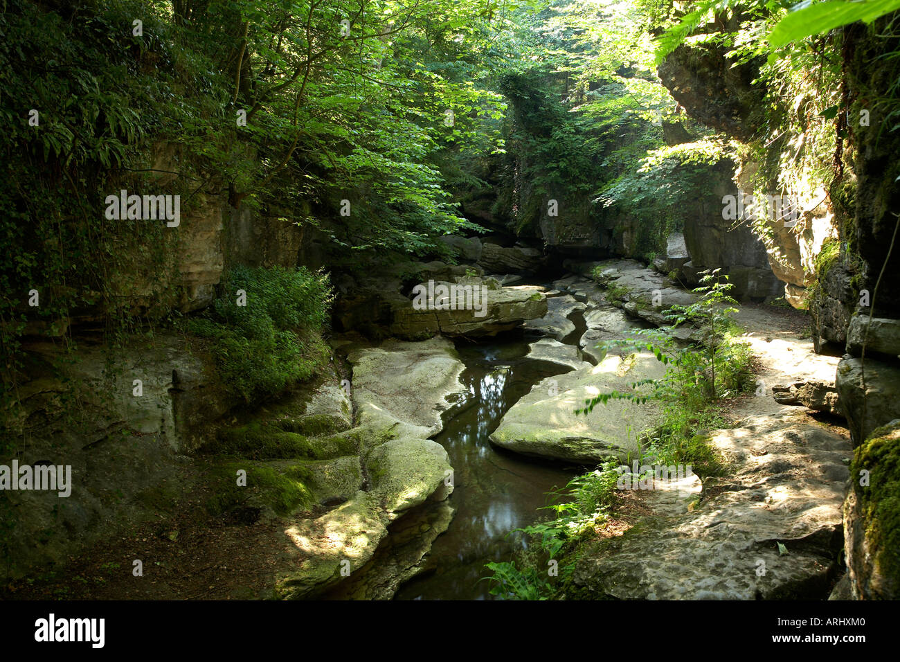 Stream flowing over rocks at How Stean Gorge at Pateley Bridge in the ...