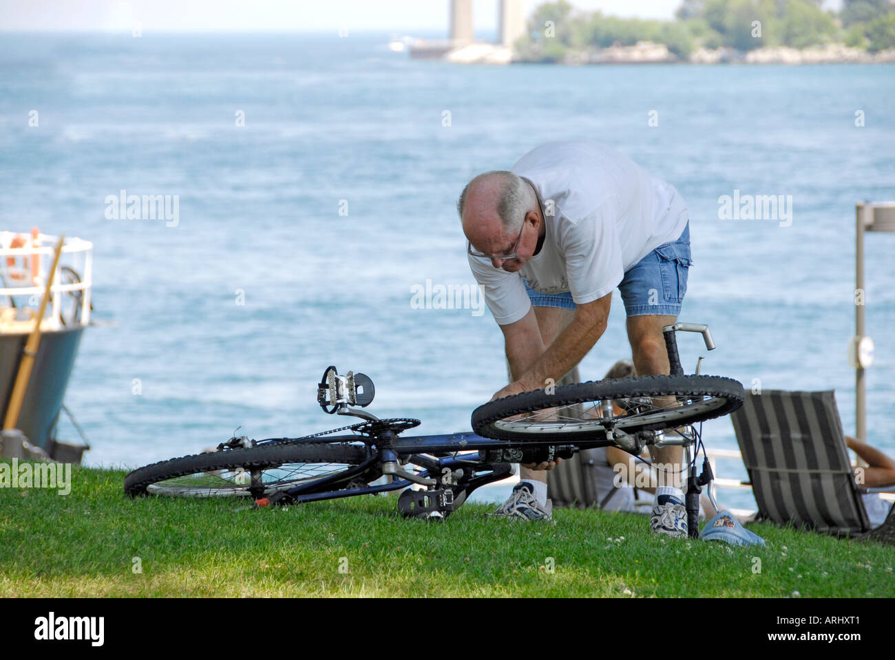 Man gets up after falling of a bicycle Stock Photo - Alamy