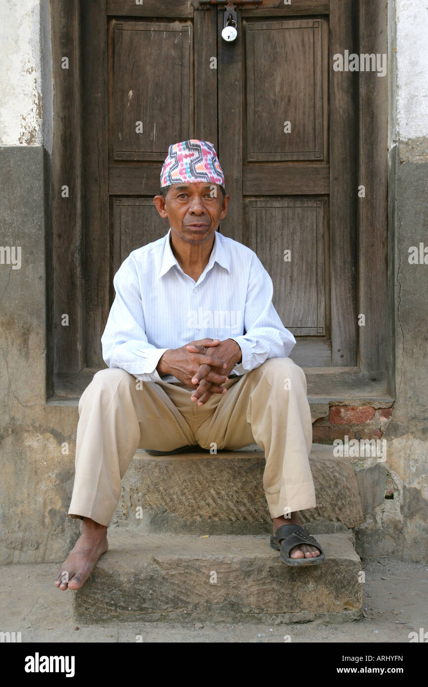 "Man wearing one shoe Nepal Stock Photo - Alamy