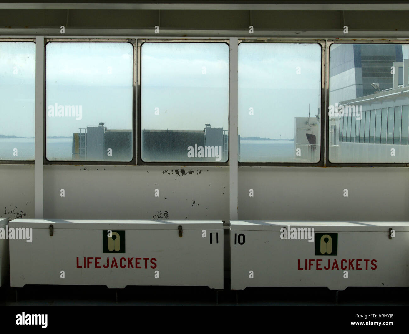 boxes for lifejackets life vests on deck of a ferry on Baltic Sea on ...