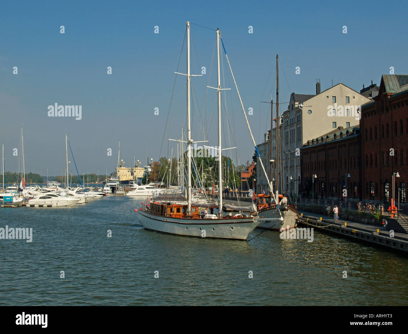 old ships boats at the northern port of Helsinki in background the ...
