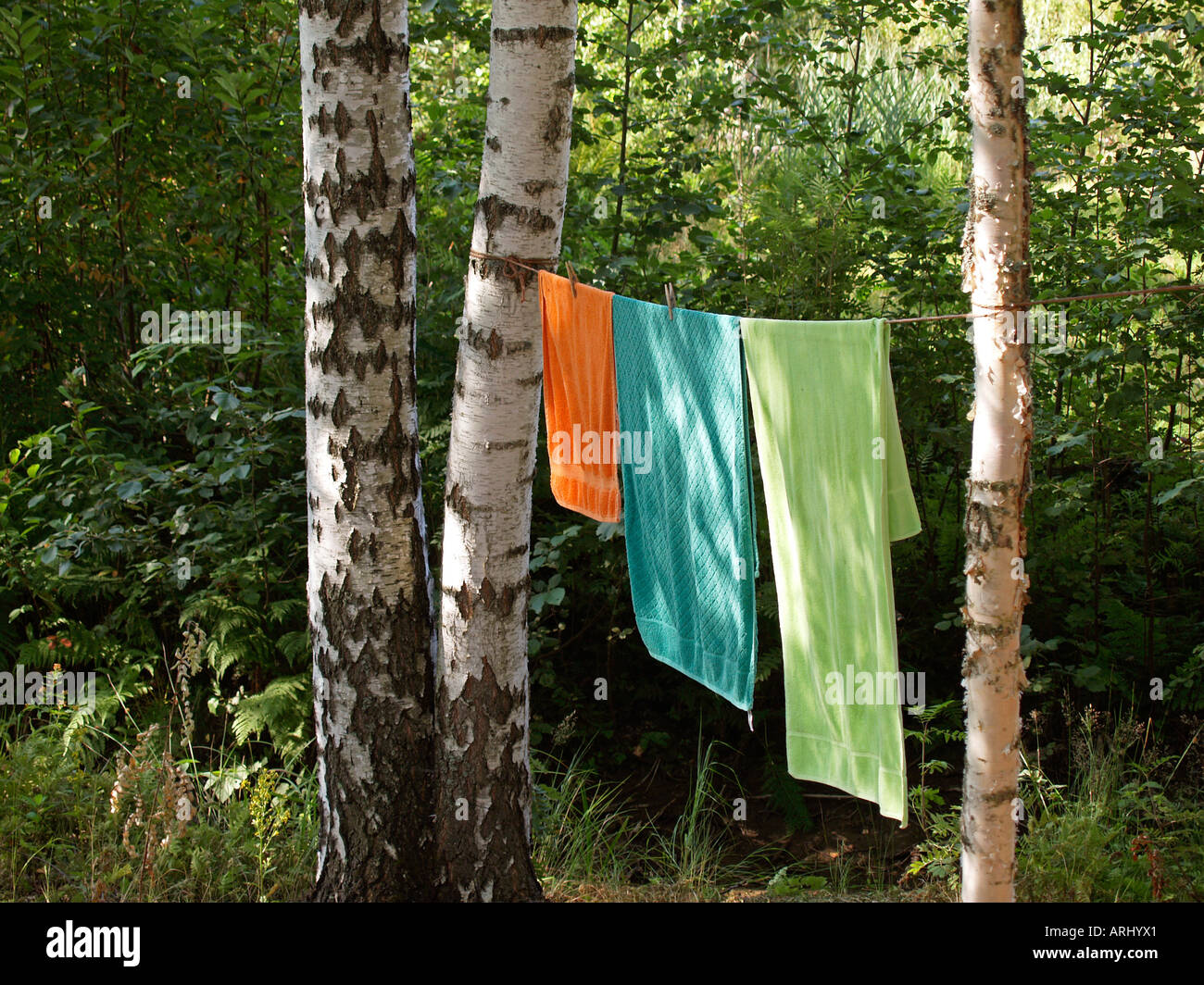 Coloured sauna towels hanging on hi-res stock photography and images ...